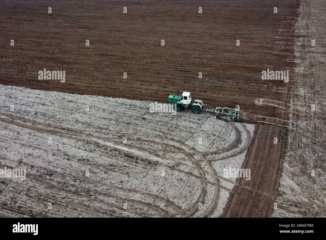 Aerial view agricultural tractor plows hi-res stock photography and ...