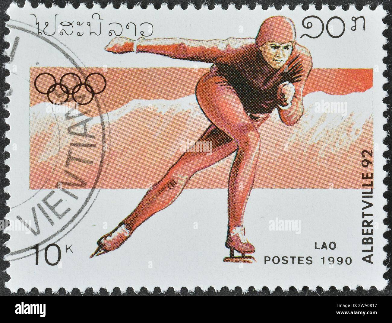 Cancelled postage stamp printed by Laos, that shows Figure skating ...