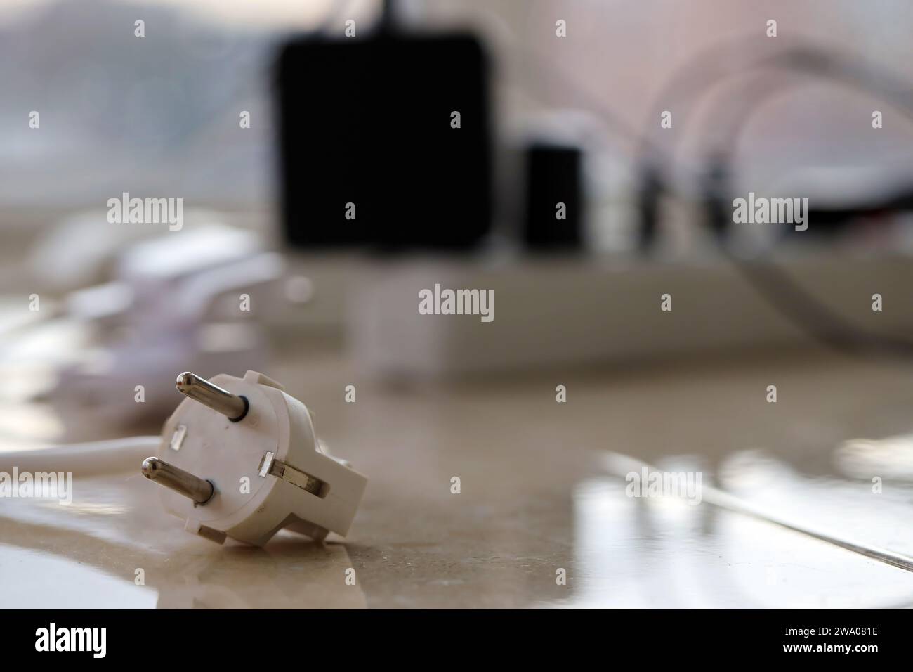 Overloaded power boards. Power strips with different electrical plugs ...