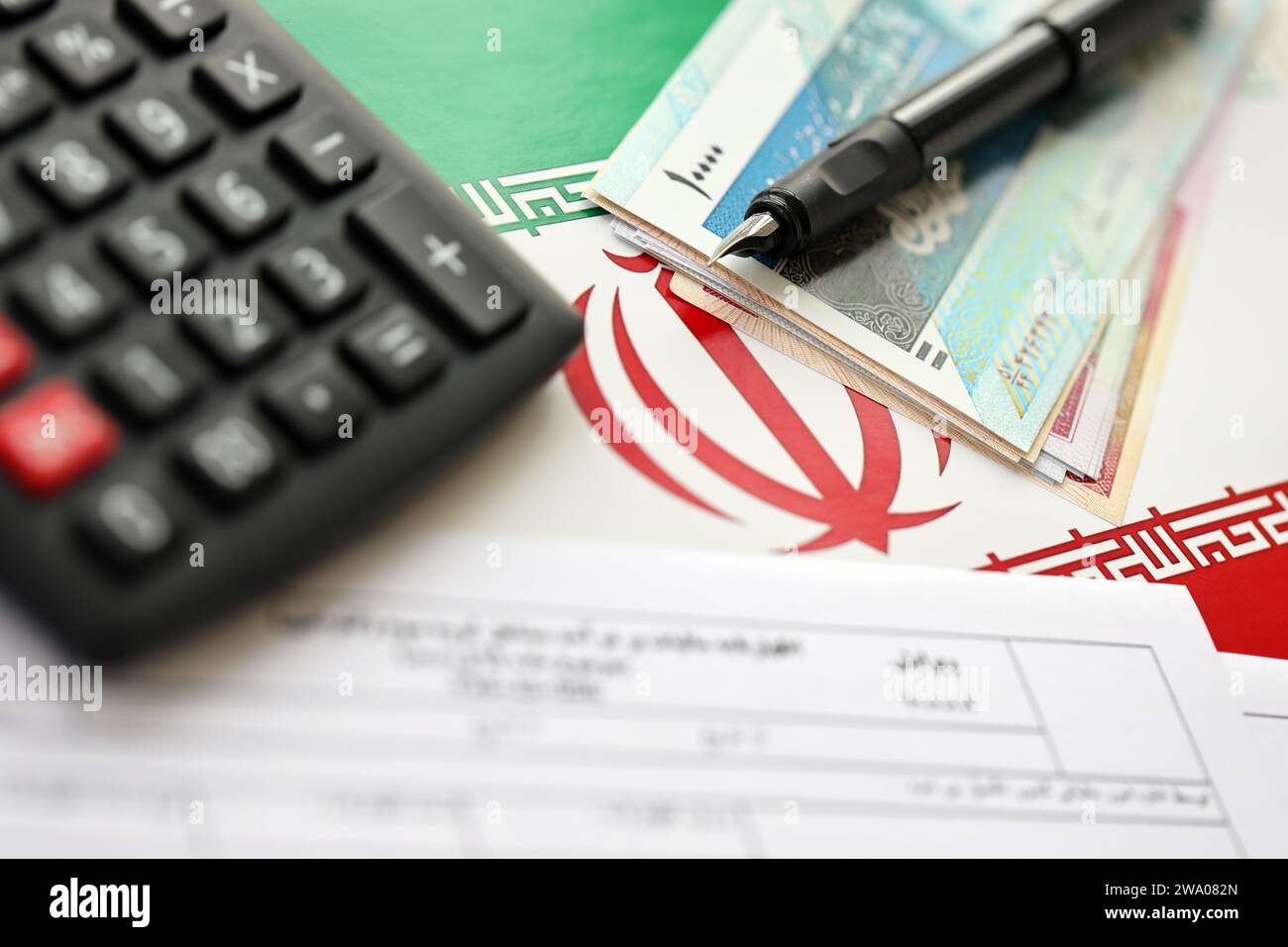 Iranian annual income tax return form F20-25-006 ready to fill on table ...