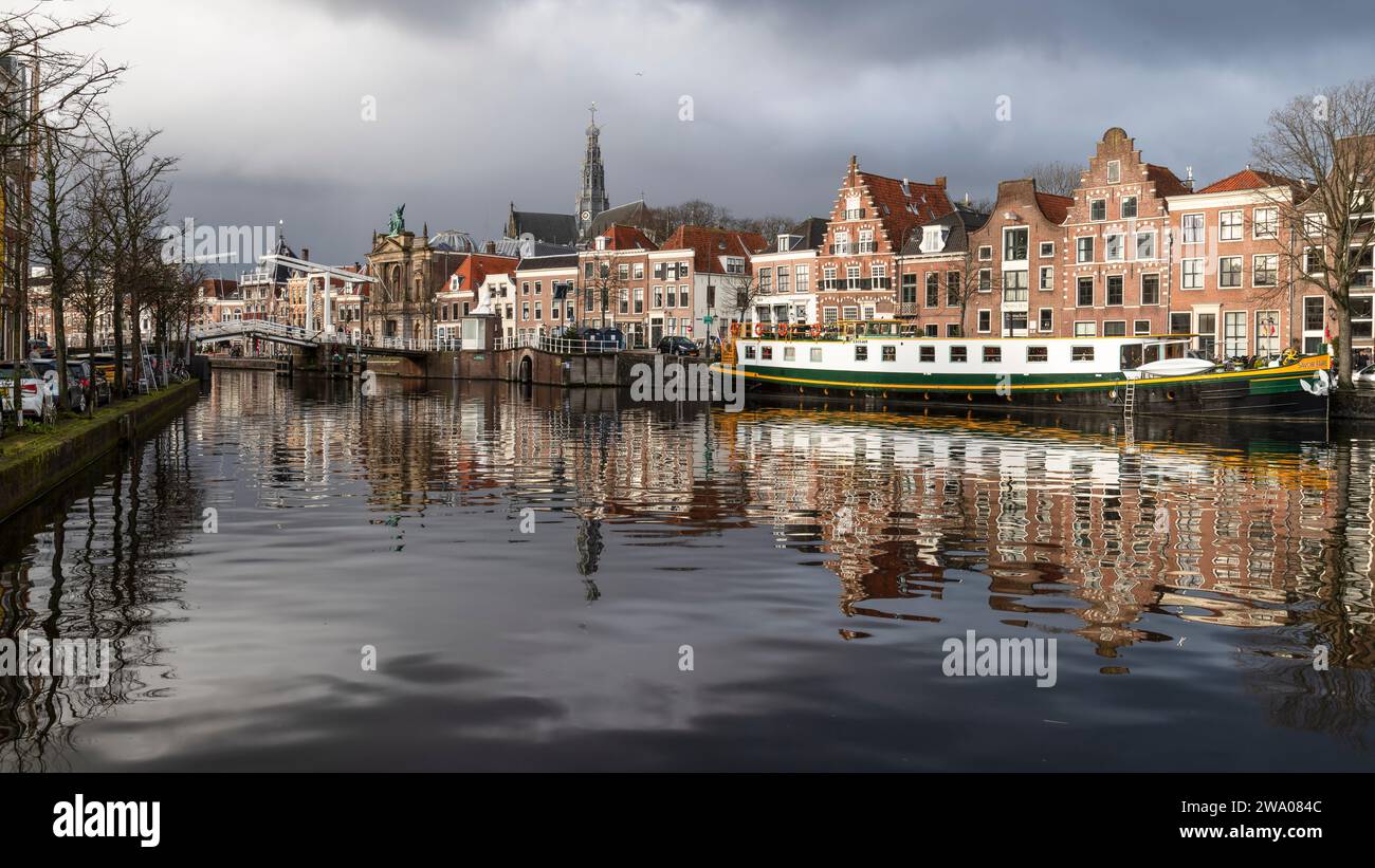 Spaarne river with historic buildings in the historic city of Haarlem ...