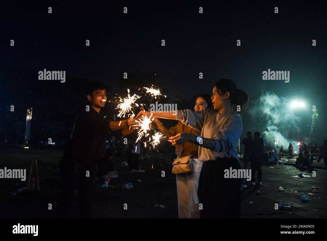 Bandung, West Java, Indonesia. 1st Jan, 2024. Visitors set off mini ...