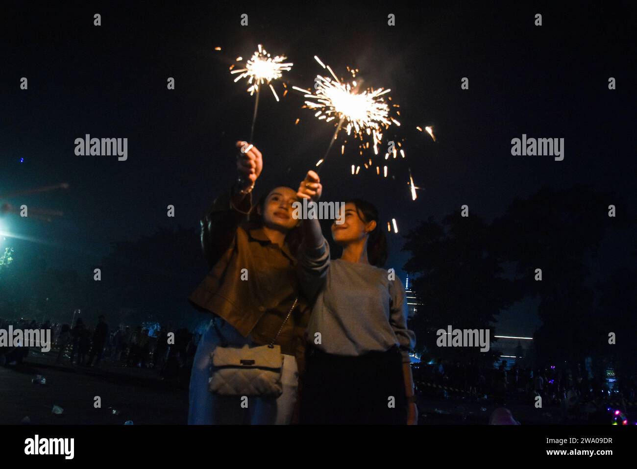 Bandung, West Java, Indonesia. 1st Jan, 2024. Visitors set off mini ...