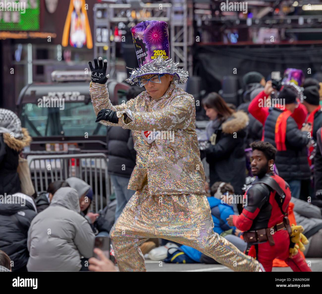 NEW YORK, N.Y. – December 31, 2023: New Year’s Eve revelers gather in ...
