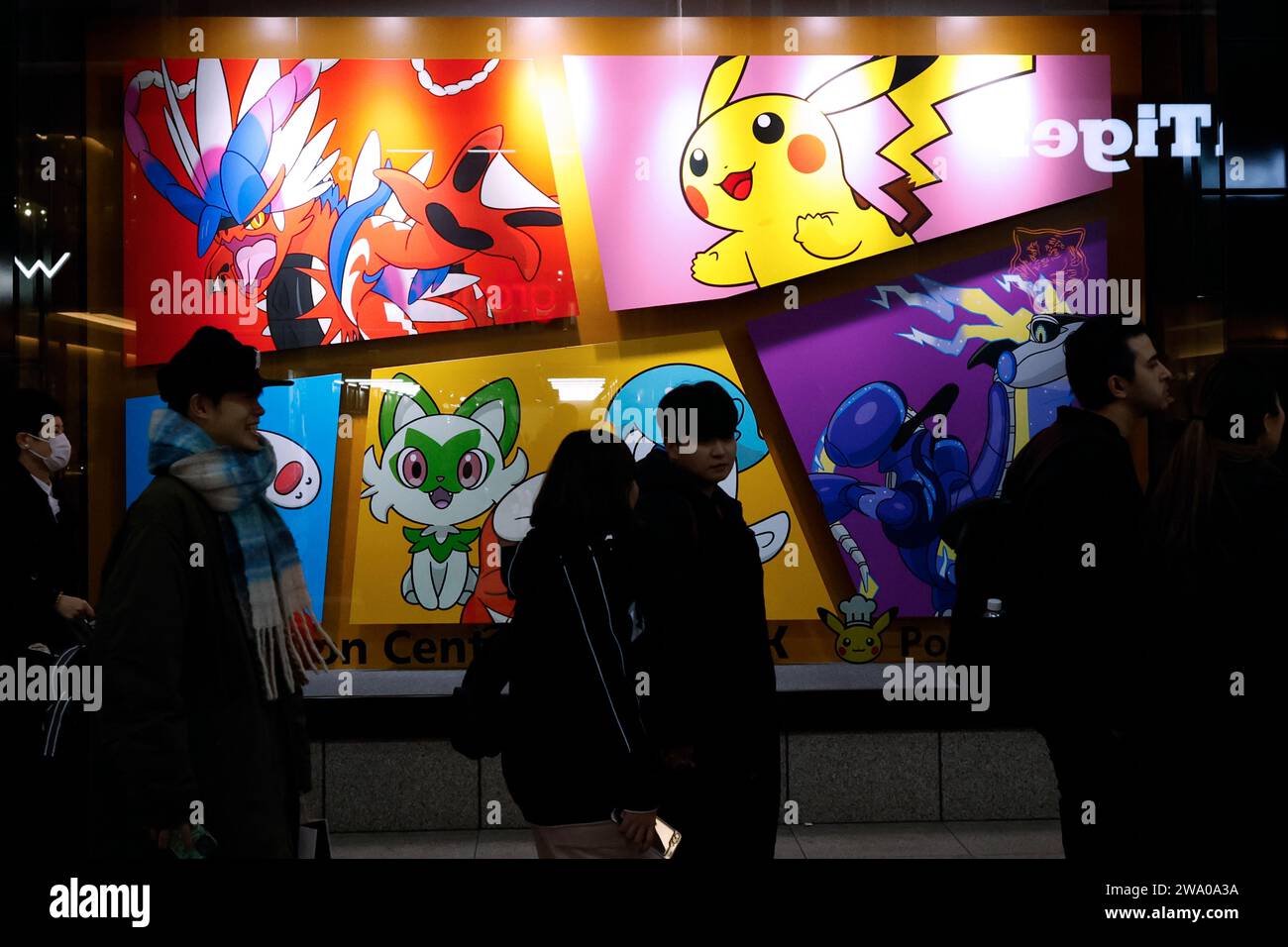Osaka, Japan. 31st Dec, 2023. Customers walk past the Pokemon Store ...