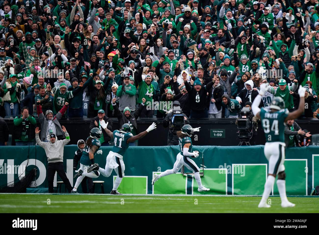 Spectators react along with Philadelphia Eagles linebacker Nicholas ...