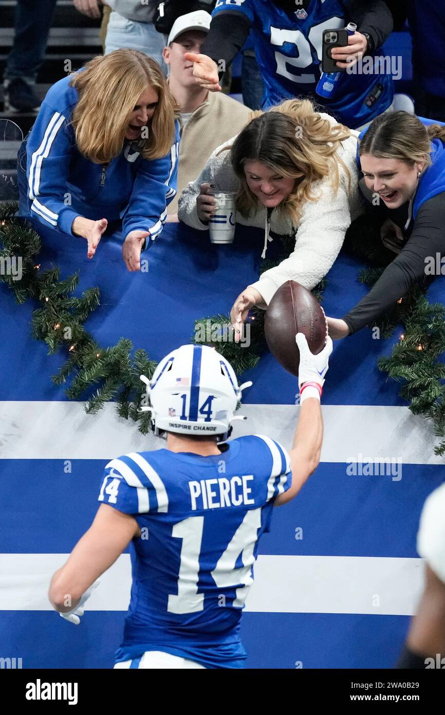 Indianapolis Colts wide receiver Alec Pierce (14) gives a football to ...