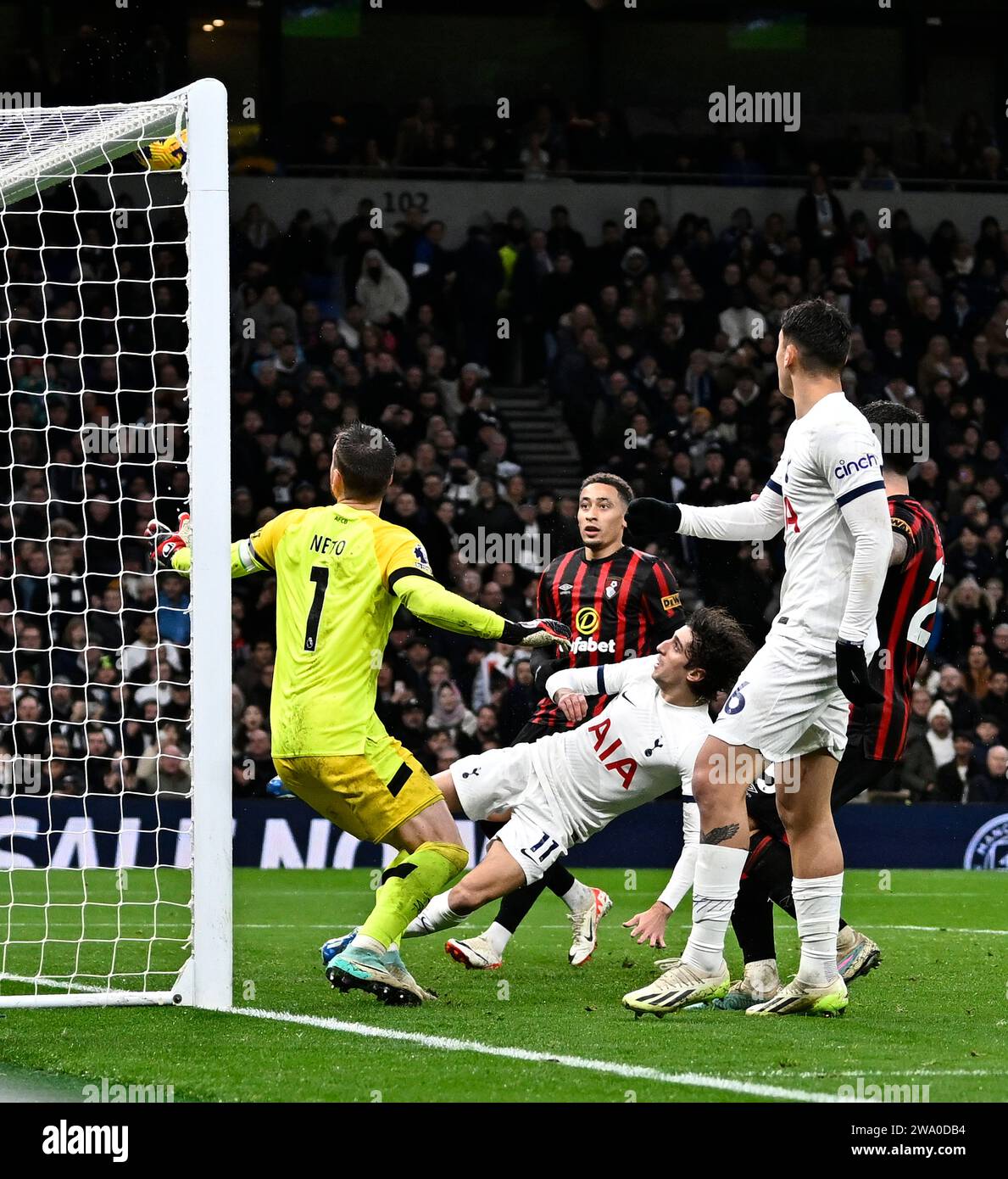London, UK. 31st Dec, 2023. Bryan Gil (Tottenham, 11) heads the ball ...