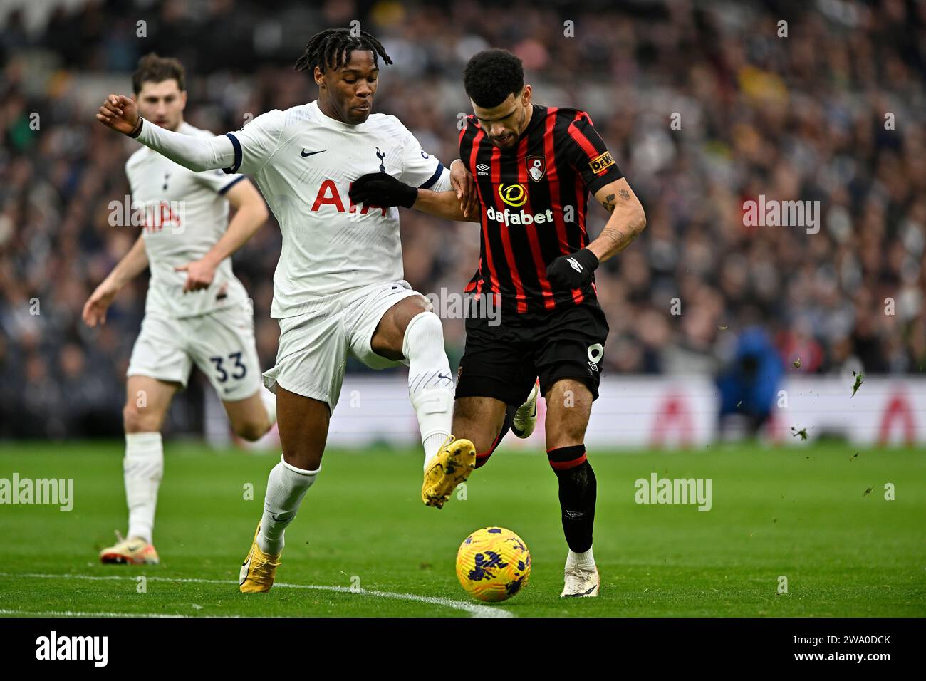 London, UK. 31st Dec, 2023. Destiny Udogie (Tottenham) and Dominic ...
