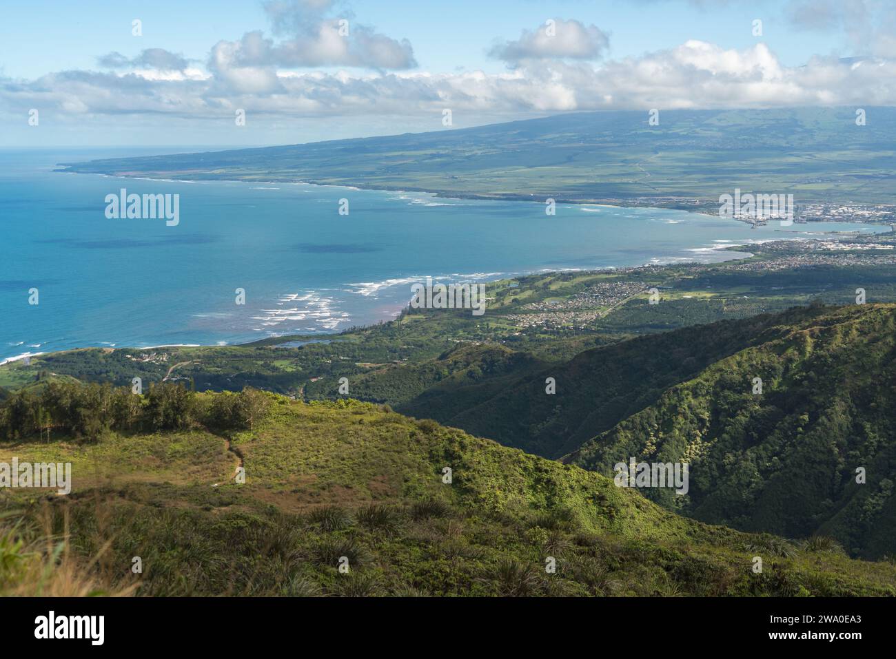 Overlooking Kahului from the lush slopes of Waihe'e Ridge, Maui unfolds ...