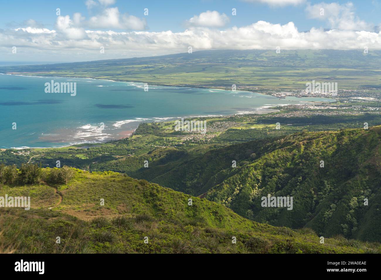 Overlooking Kahului from the lush slopes of Waihe'e Ridge, Maui unfolds ...