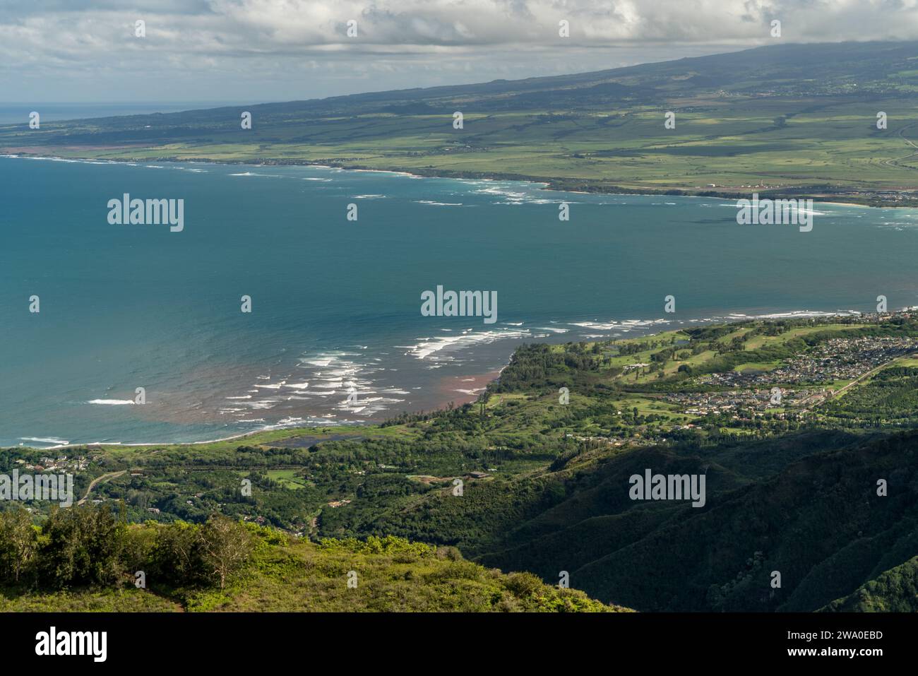 Overlooking Kahului from the lush slopes of Waihe'e Ridge, Maui unfolds ...