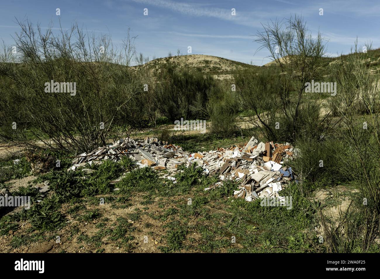 A pile of rubble illegally dumped in the middle of the countryside by ...