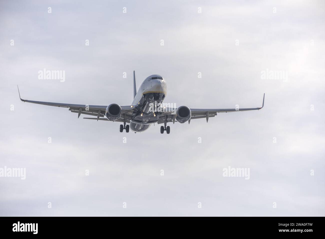 Front image and blue lower fuselage of a commercial airplane with the ...