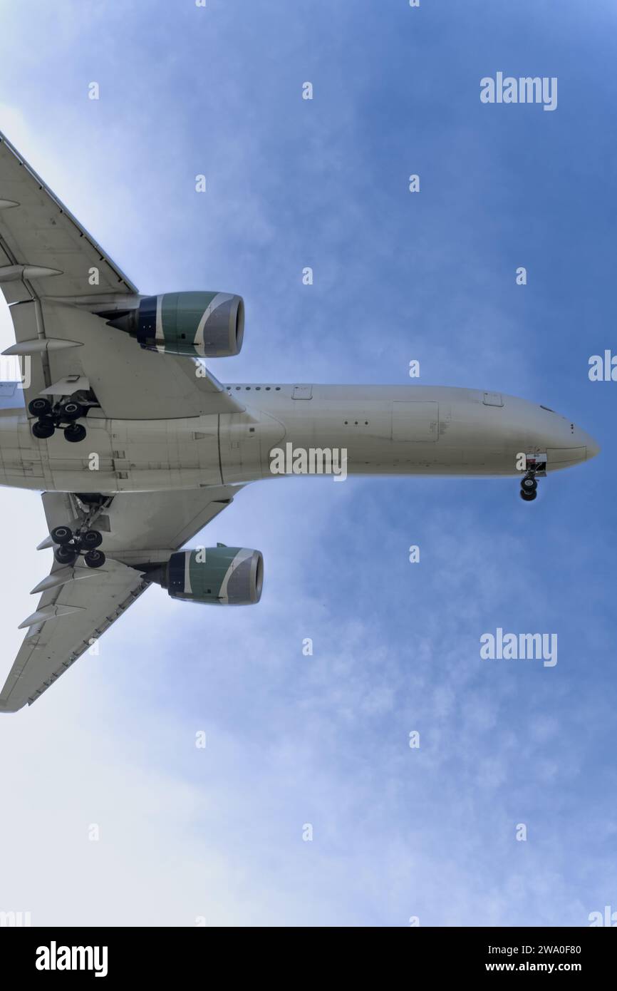 Belly view of a jet airplane with landing gear Stock Photo - Alamy