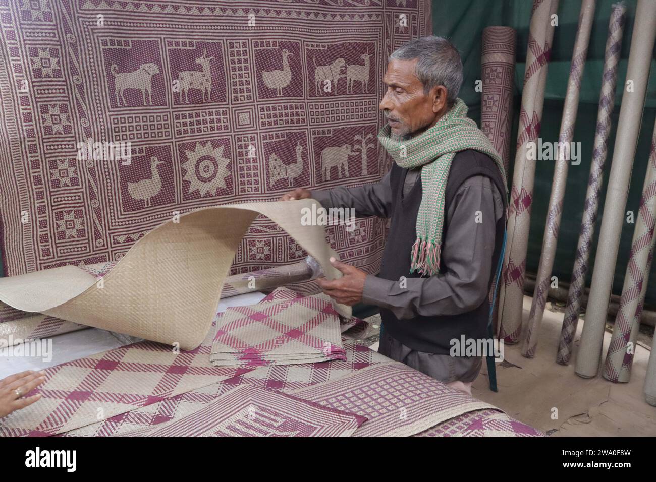 Dhaka, Bangladesh. 1st Jan, 2024. A shop owner sells handmade shitol ...