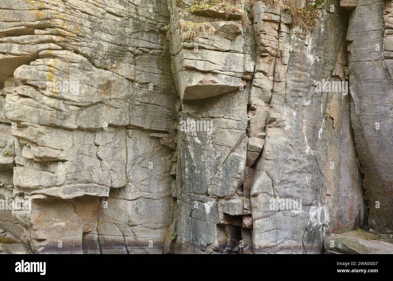 Light coarse natural rock stone background. Mining cliff rough front ...