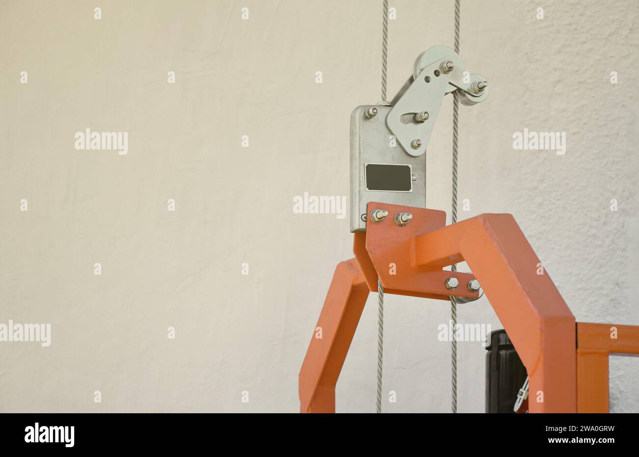 Safety lock as part of suspended wire rope platform for facade works on ...