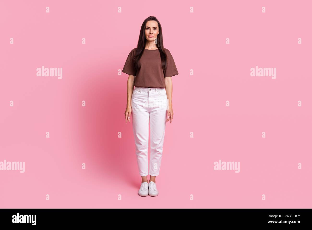 Full size portrait of attractive positive girl standing posing empty ...