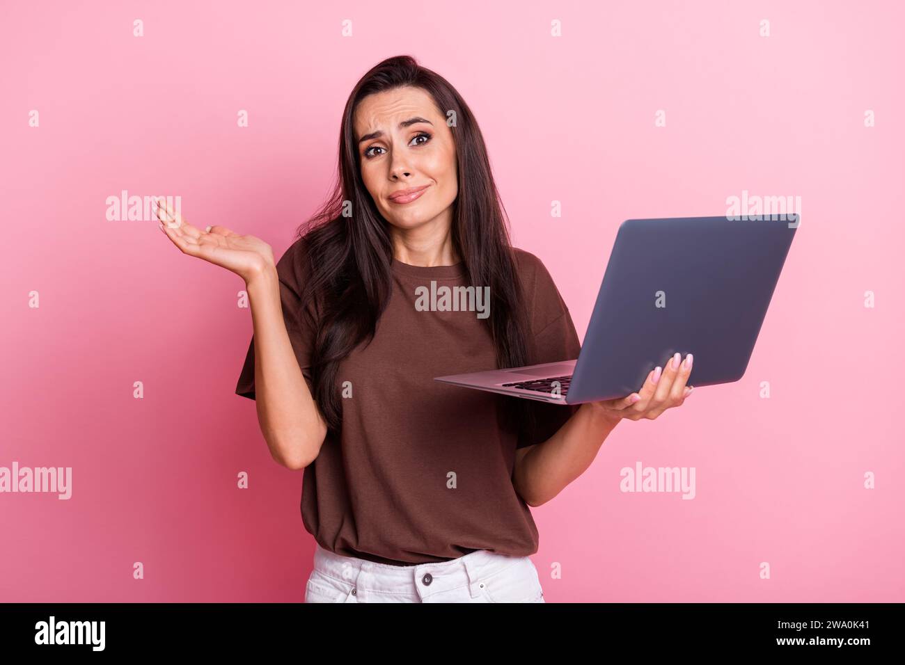 Photo of young funny woman working indifferent shrug shoulders ignoring ...