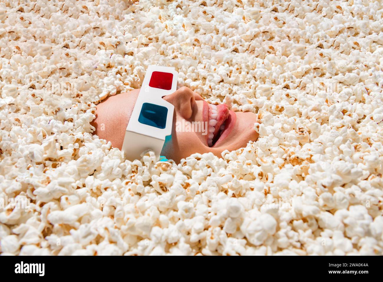 Girl tongue popcorn hi-res stock photography and images - Alamy