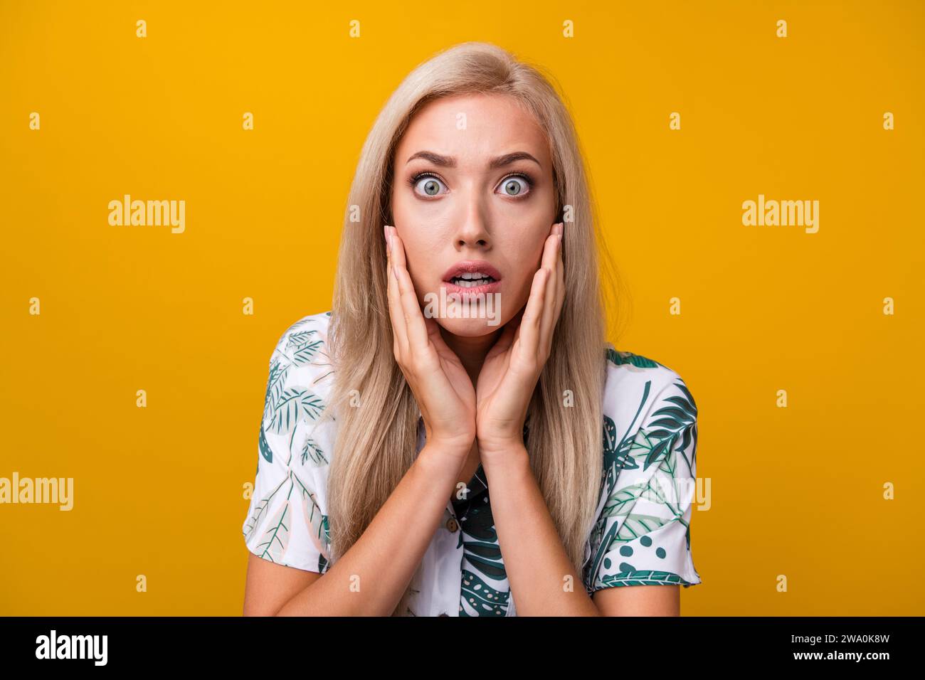 Photo of stunned woman with straight hairstyle dressed shirt arms on ...