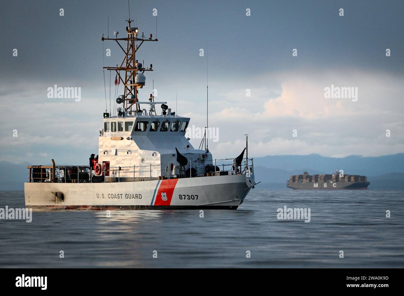 Coast Guard Cutter Osprey [WPB 87307] idles near the entrance of the ...