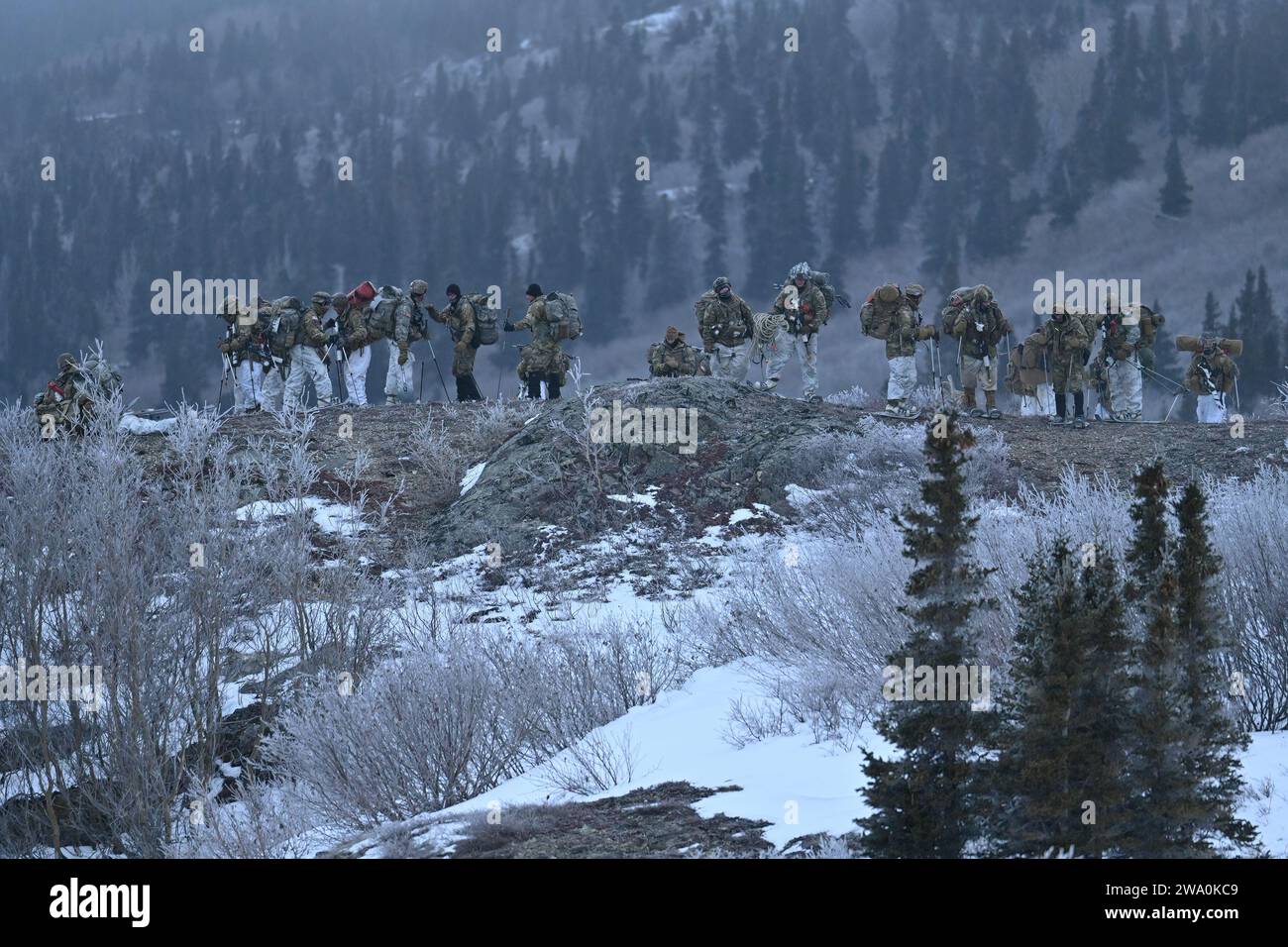 Northern Warfare Training Center students pause during a cross-country ...