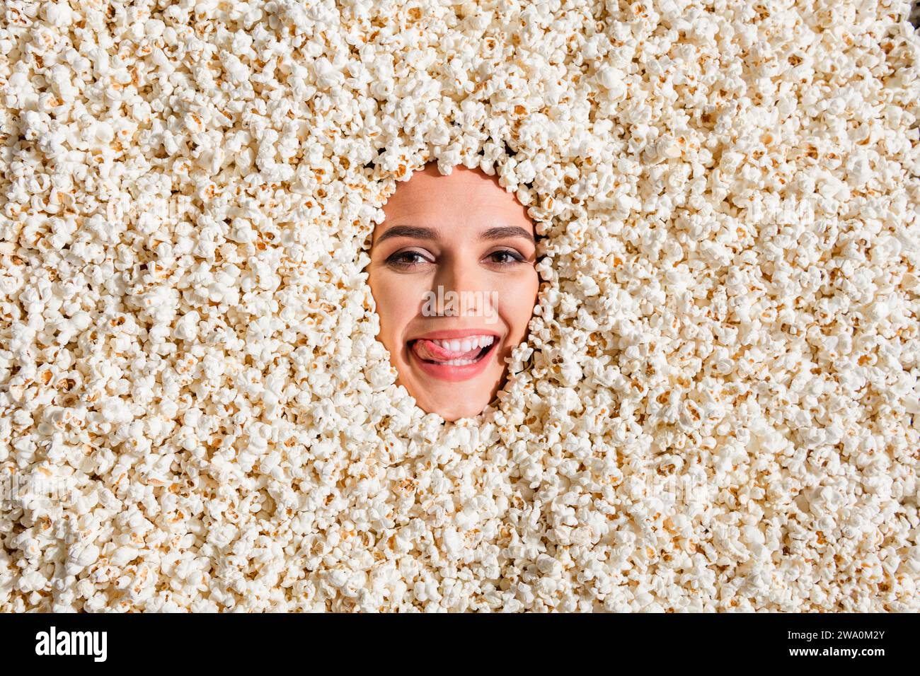 Girl tongue popcorn hi-res stock photography and images - Alamy