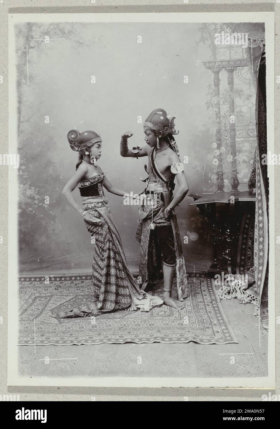 Studio Portrait of two Javanese dancers in traditional clothing and ...