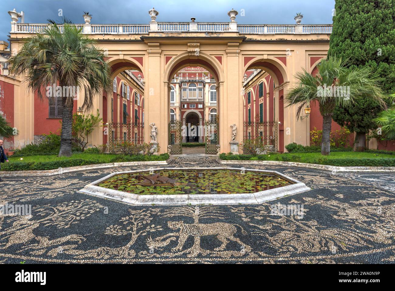Palazzo Reale, in front mosaics and pond of the garden of the former ...