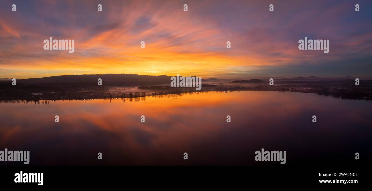 Aerial panorama of an atmospheric sunset over the Untersee, the western ...
