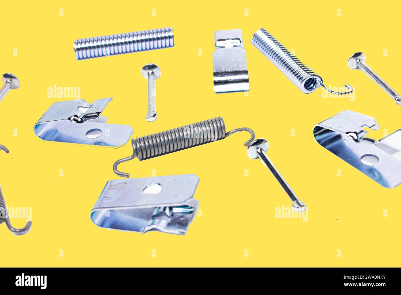 Parking brake springs and clamps repair kit on yellow isolated ...