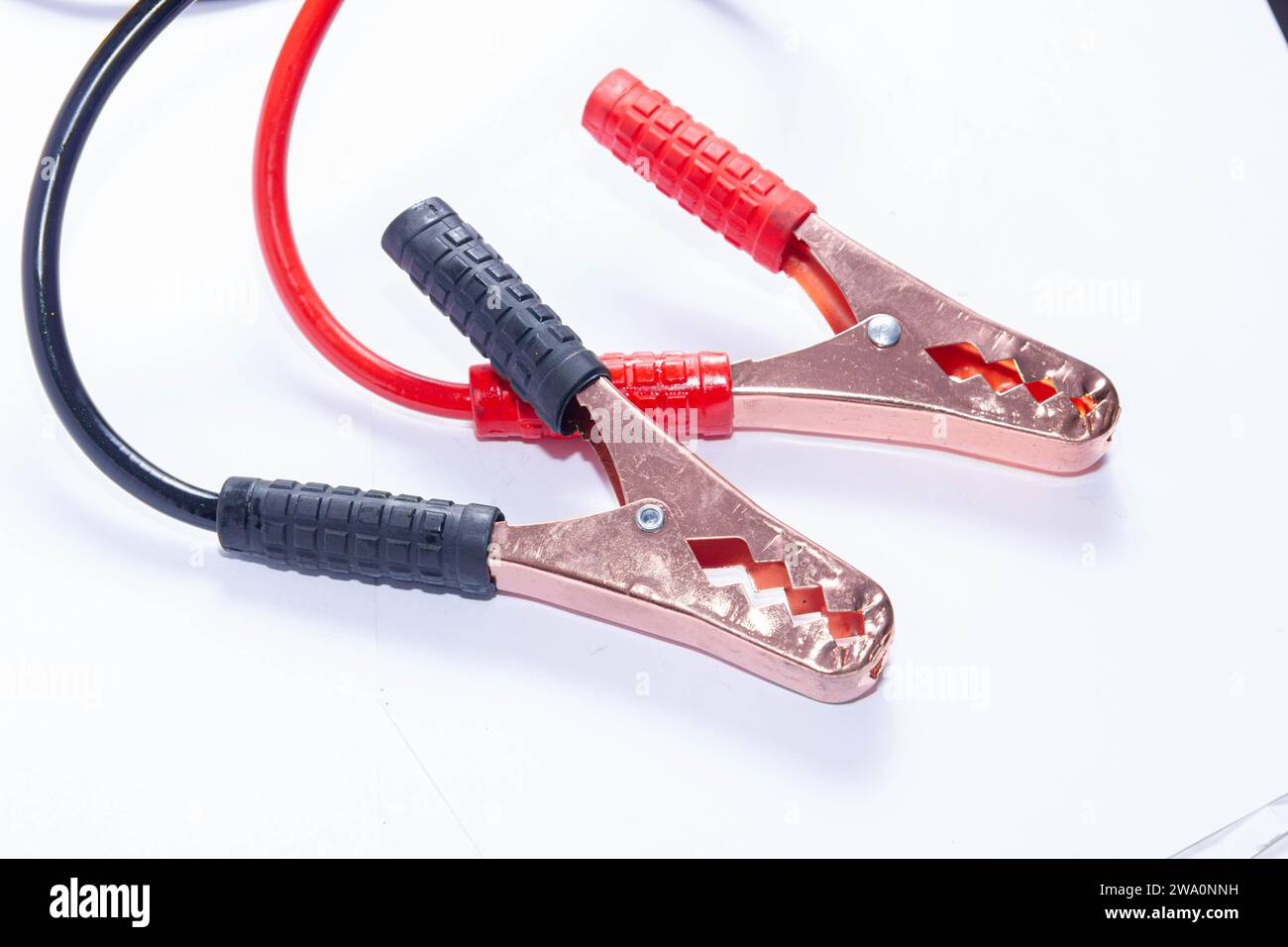 Jumper cables for car on white isolated background Stock Photo - Alamy