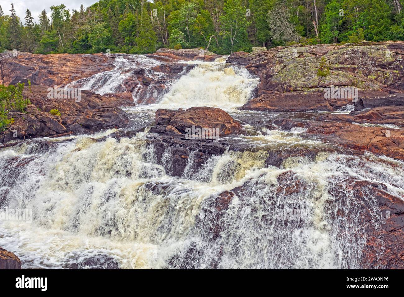 Wild River Tumbling Across Ancient Rocks on the Sand River in Superior ...