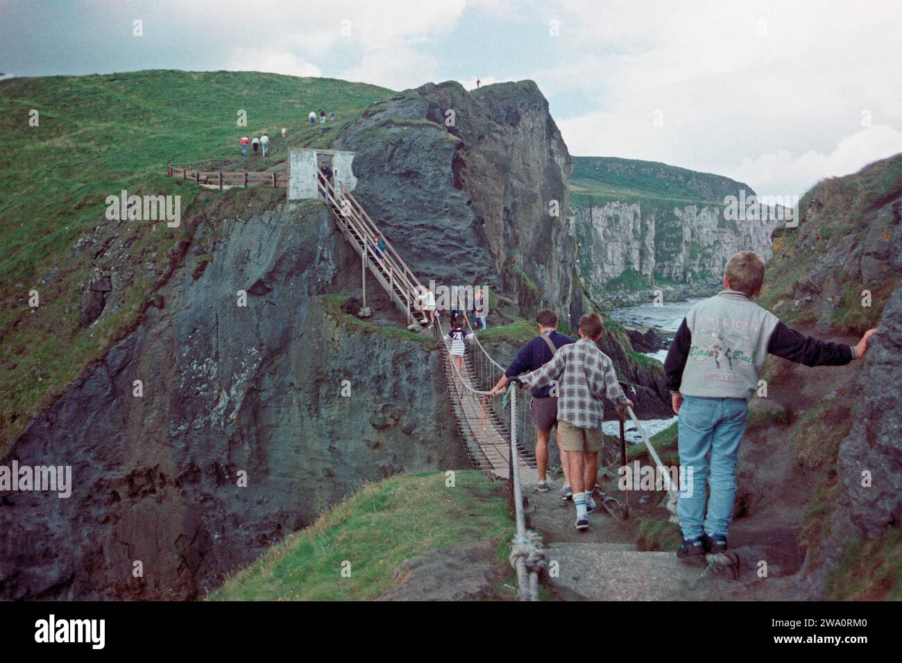 People, children, cliffs, Carrick-a-Rede Suspension Bridge, Ballintoy ...