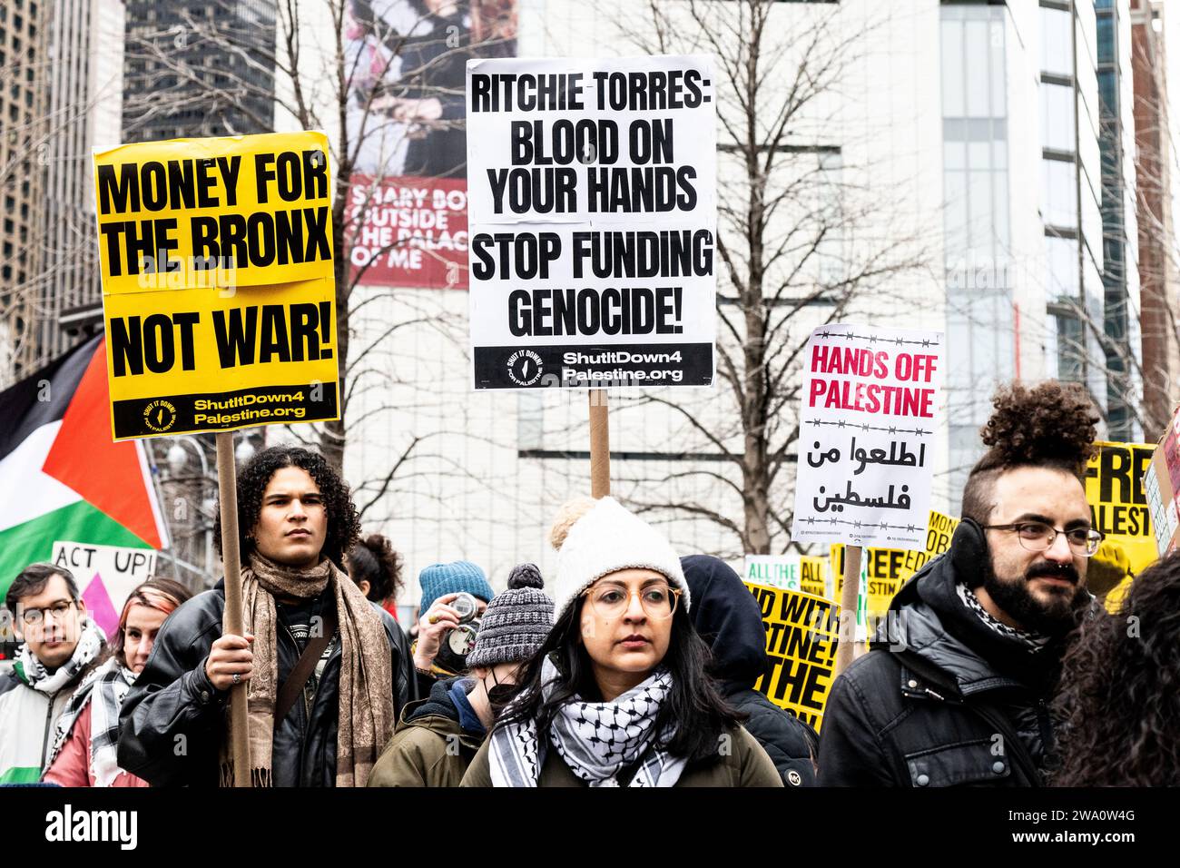 New York City, United States. 31st Dec, 2023. People holding signs ...