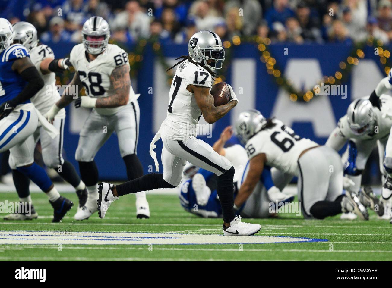 Las Vegas Raiders wide receiver Davante Adams (17) runs down the field ...