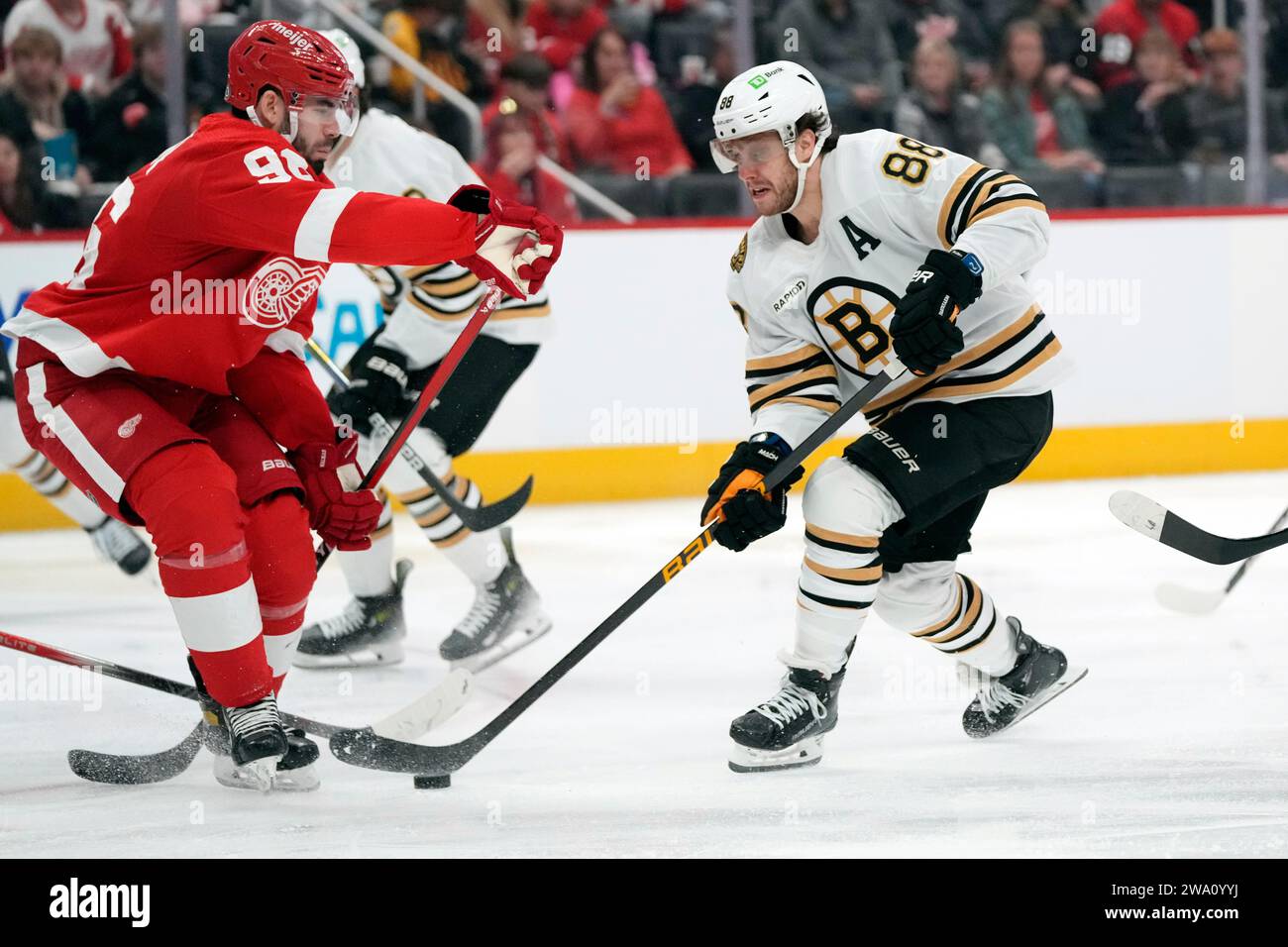 Boston Bruins right wing David Pastrnak (88) controls the puck as ...