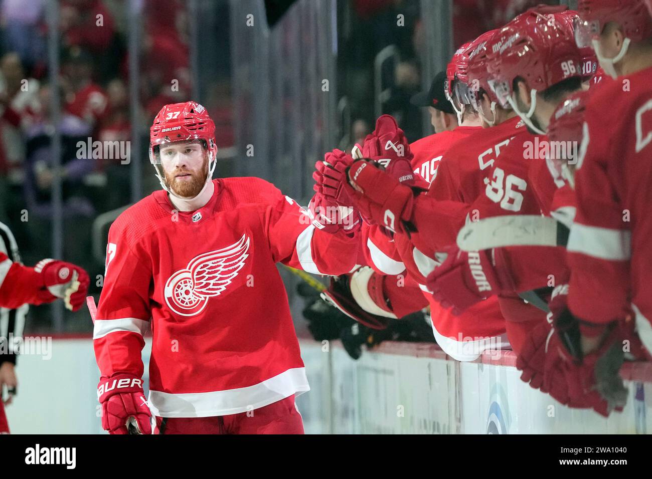 Detroit Red Wings left wing J.T. Compher (37) greets teammates after ...