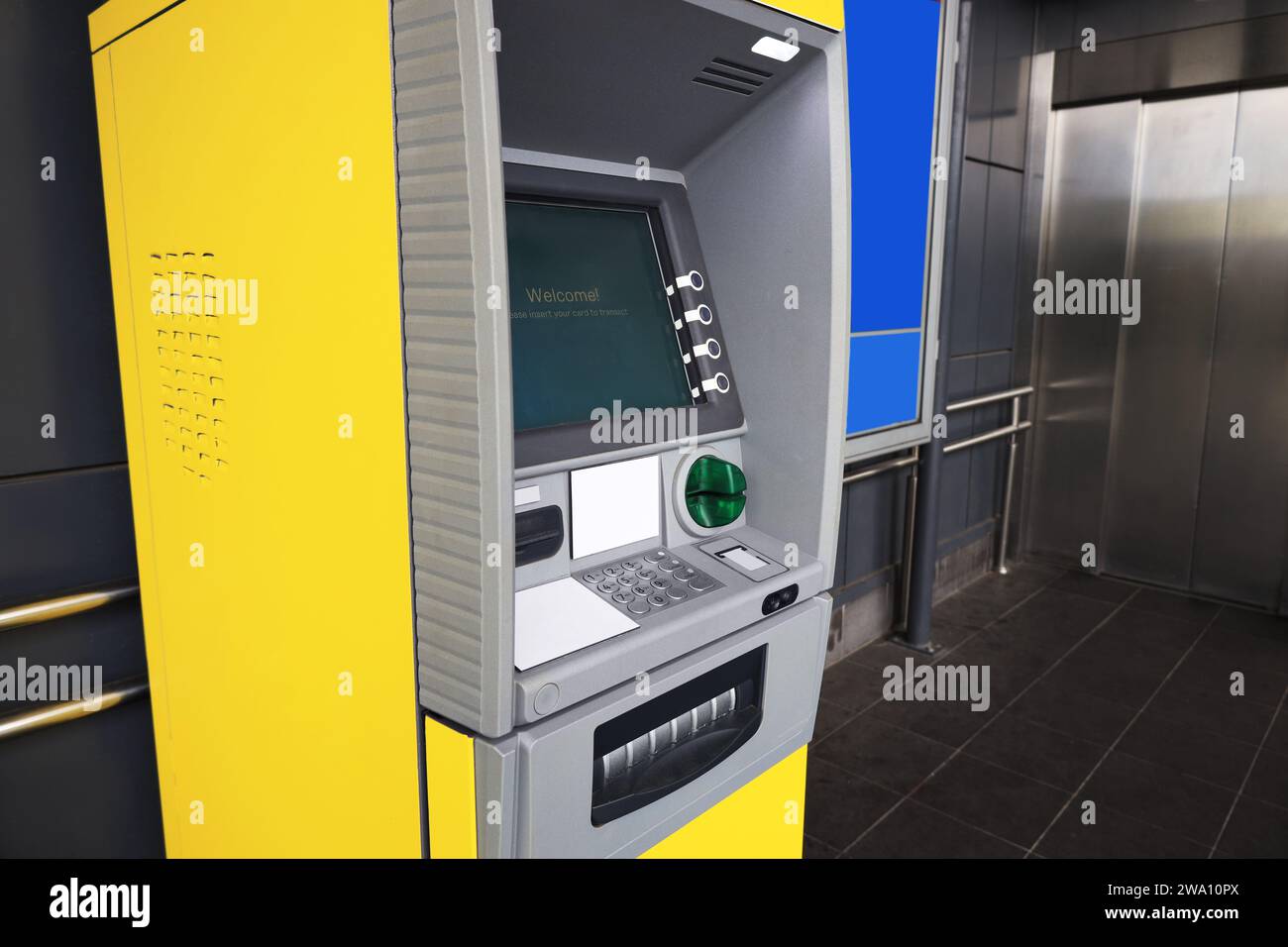 Modern automated teller machine near building outdoors Stock Photo - Alamy
