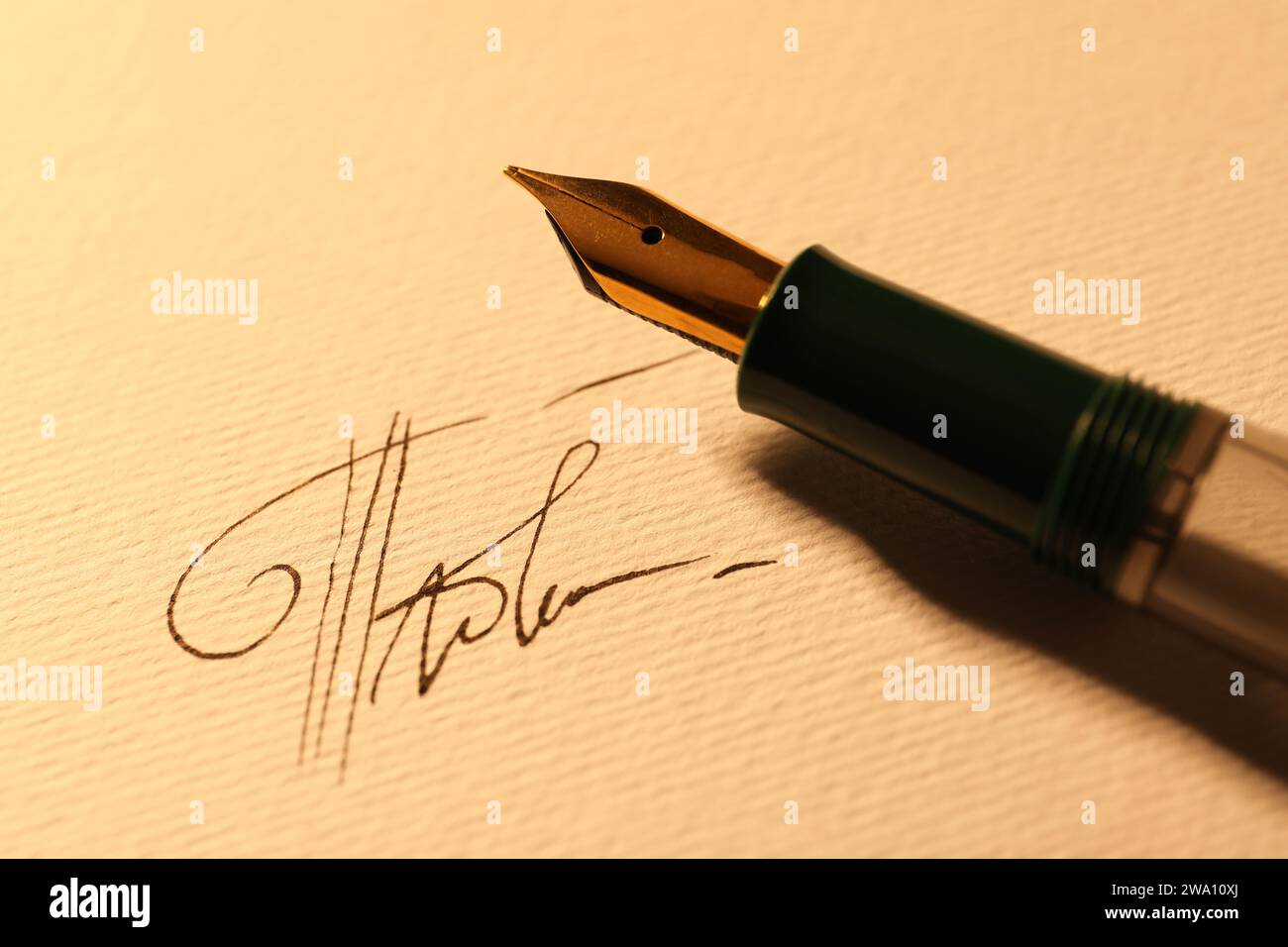 Sheet of paper with fountain pen and signature, closeup Stock Photo - Alamy