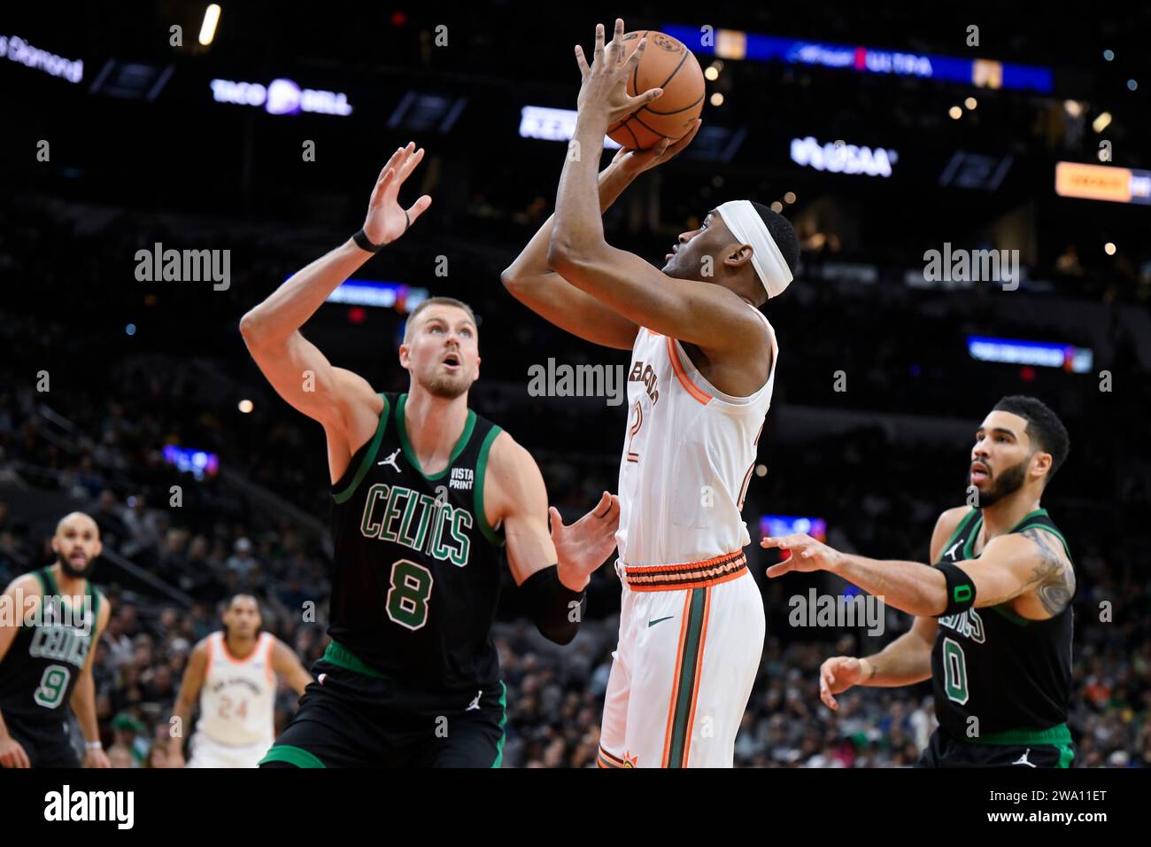 San Antonio Spurs' Malaki Branham attempts to shoot as he is defended ...
