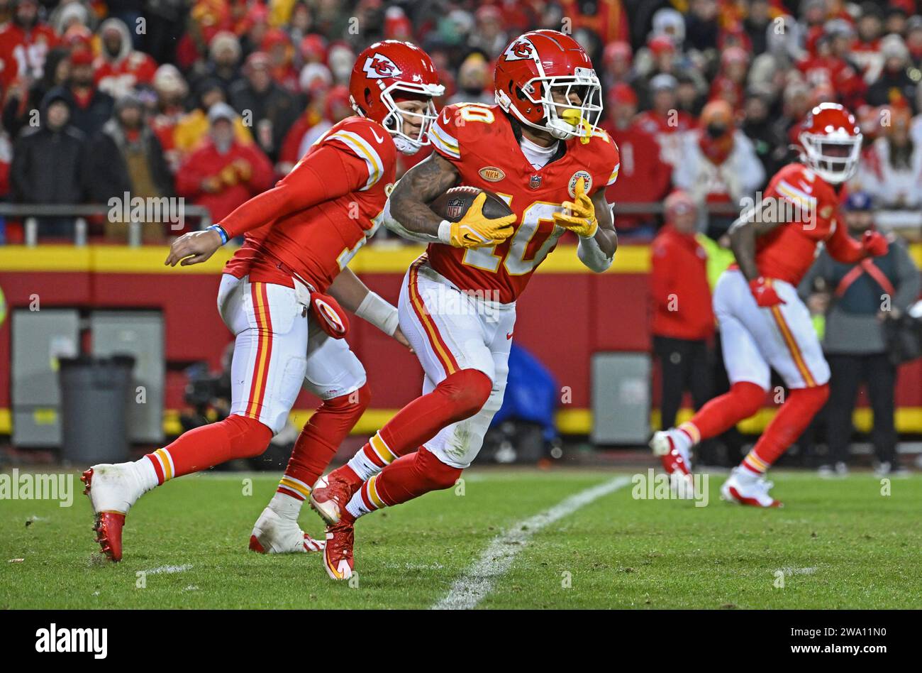 Kansas City Chiefs running back Isiah Pacheco (10) takes a hand off ...