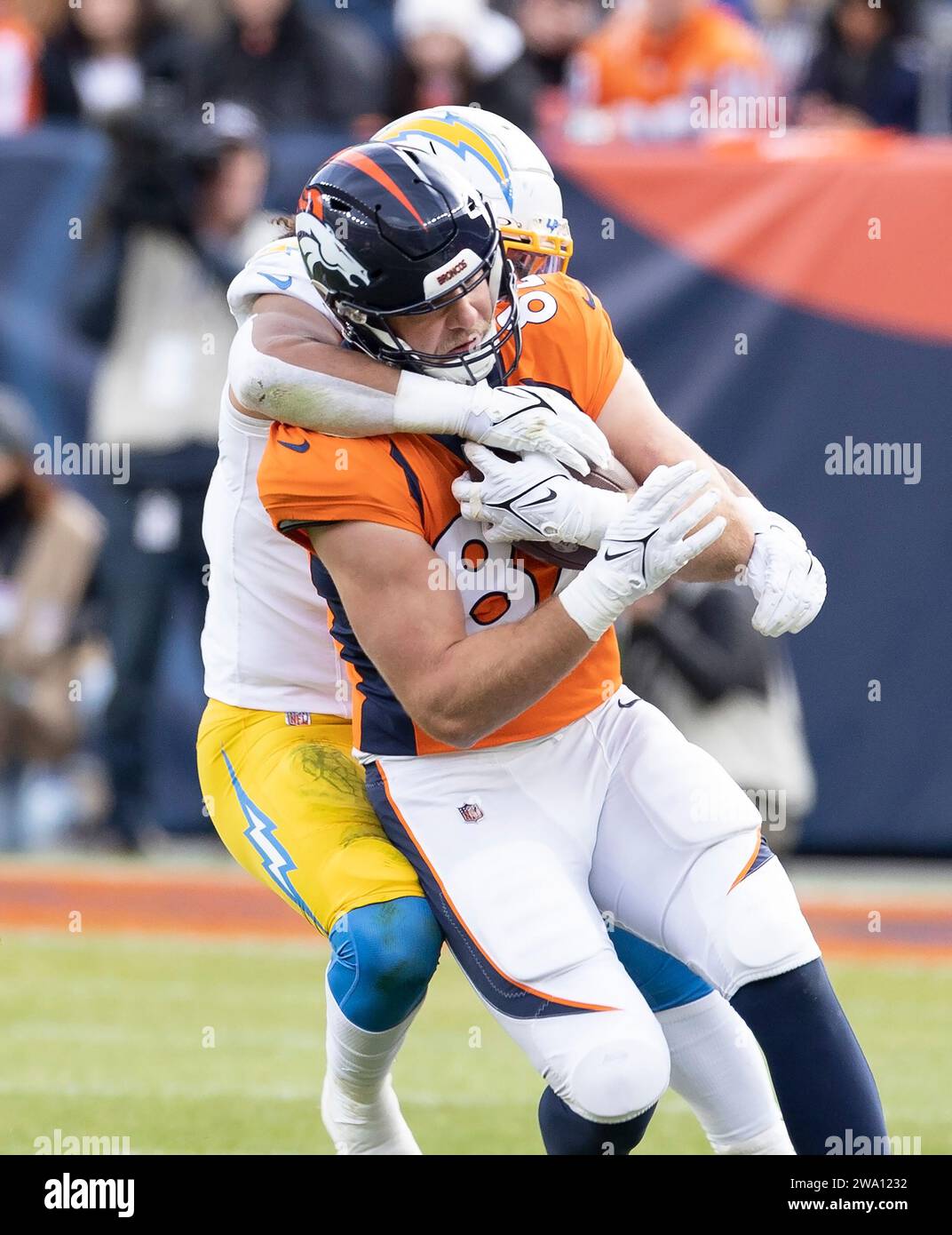 Denver, Colorado, USA. 31st Dec, 2023. Broncos TE ADAM TRAUTMAN gets ...