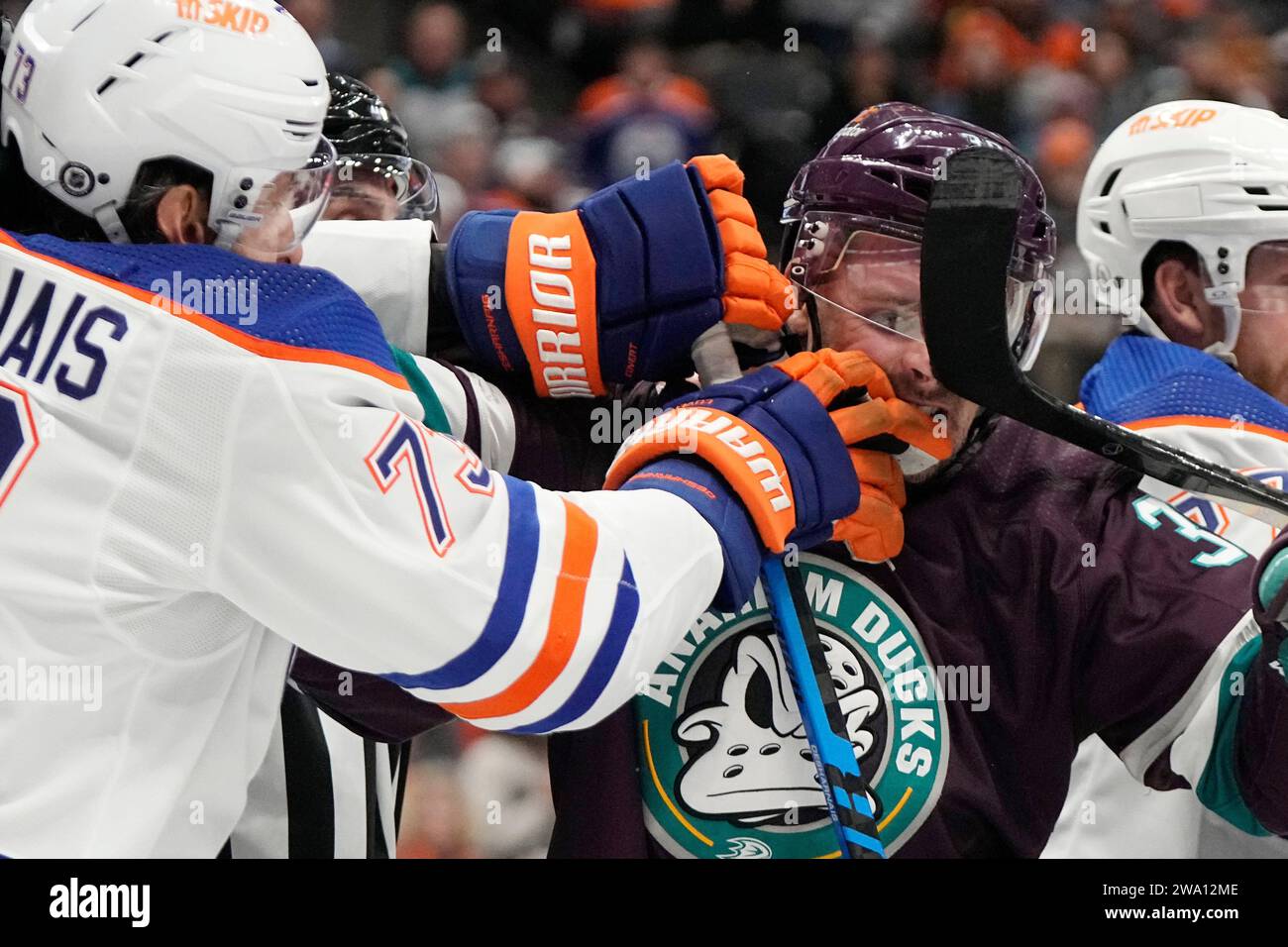 Edmonton Oilers defenseman Vincent Desharnais, left, scuffles with ...