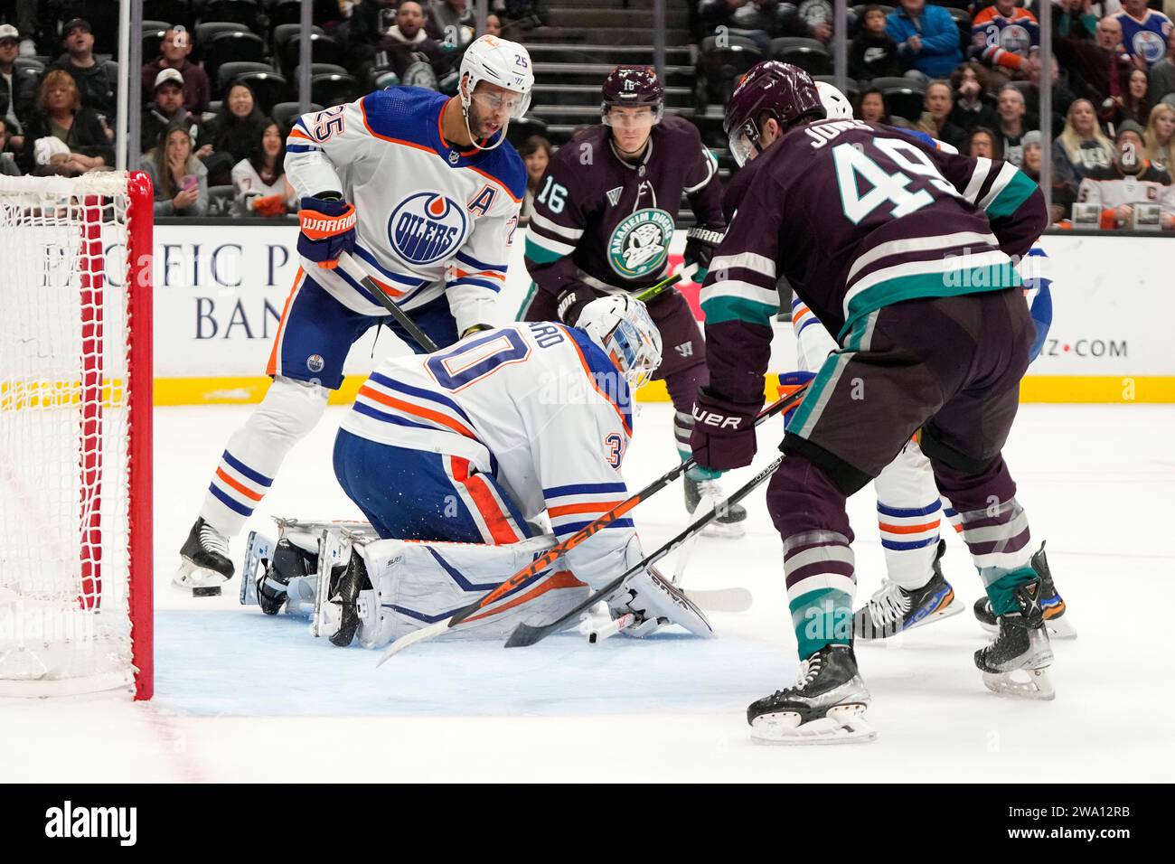Anaheim Ducks left wing Max Jones, right, scores on Edmonton Oilers ...