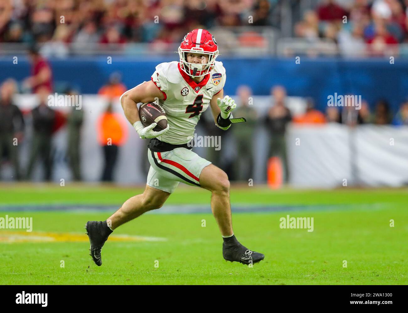 December 30, 2023:.Georgia Bulldogs tight end Oscar Delp (4) runs with ...