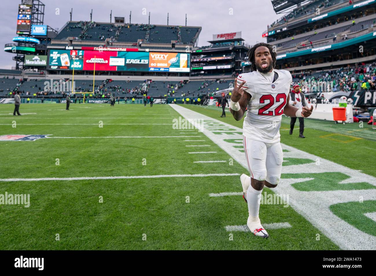 Arizona Cardinals running back Michael Carter (22) heads off the field ...