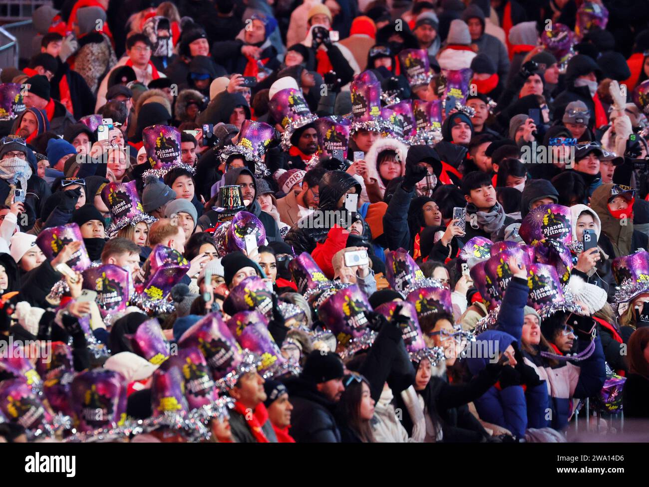 New York, United States. 31st Dec, 2023. Revellers pack Times Square ...